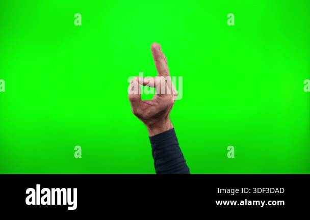 Hand makes a gesture OK. Everything is good on a green background ...