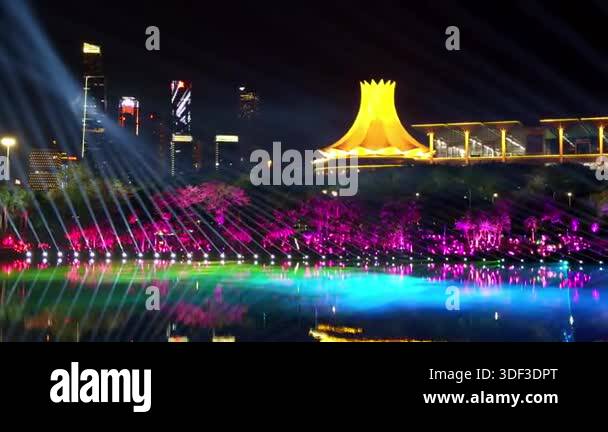 The brightly lit night view of the Minge Lake area in Nanning, Guangxi ...