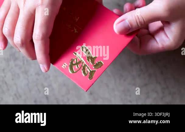 Giving Red Envelopes angpao with Thai Banknotes for Lunar New Year ...
