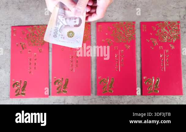 Giving Red Envelopes angpao with Thai Banknotes for Lunar New Year ...