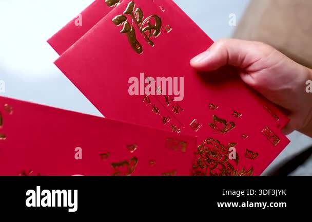 Red Envelope in Hand holding, Angpao Envelope with Golden Chinese ...