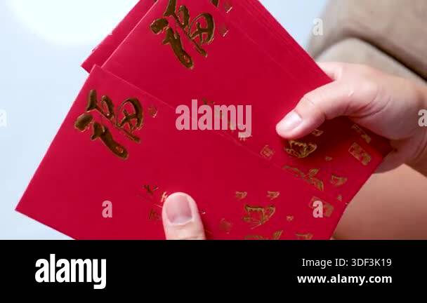Red Envelope in Hand holding, Angpao Envelope with Golden Chinese ...