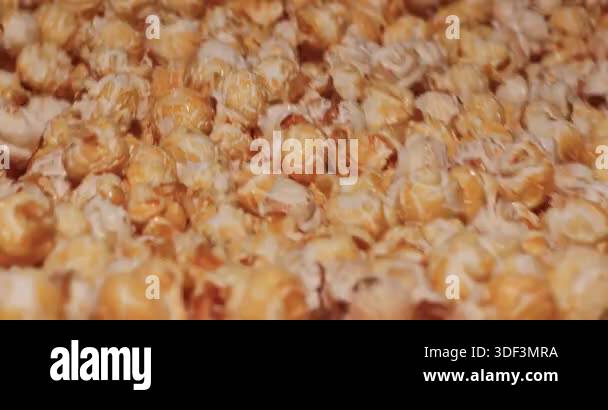 Popcorn is made in a big batch using butter and corn kernels. The ...