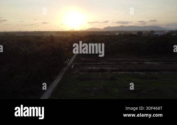 aerial footage scene of the distance evening horizon sun setting sky ...