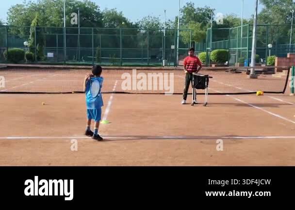 Delhi, India, February 17, 2025 - Junior tennis players having coaching ...