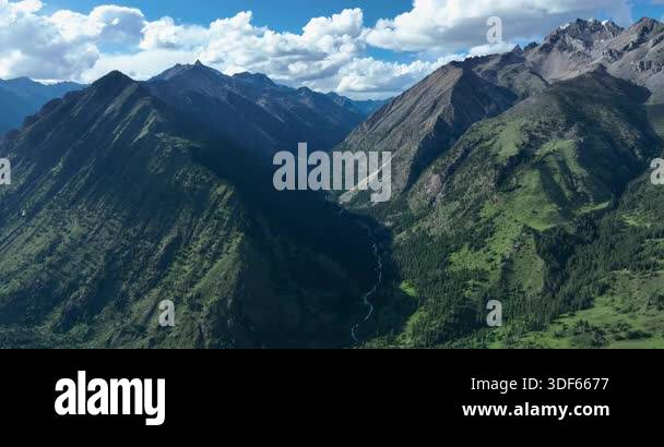Aerial view of beautiful high altitude mountains, river and forest ...