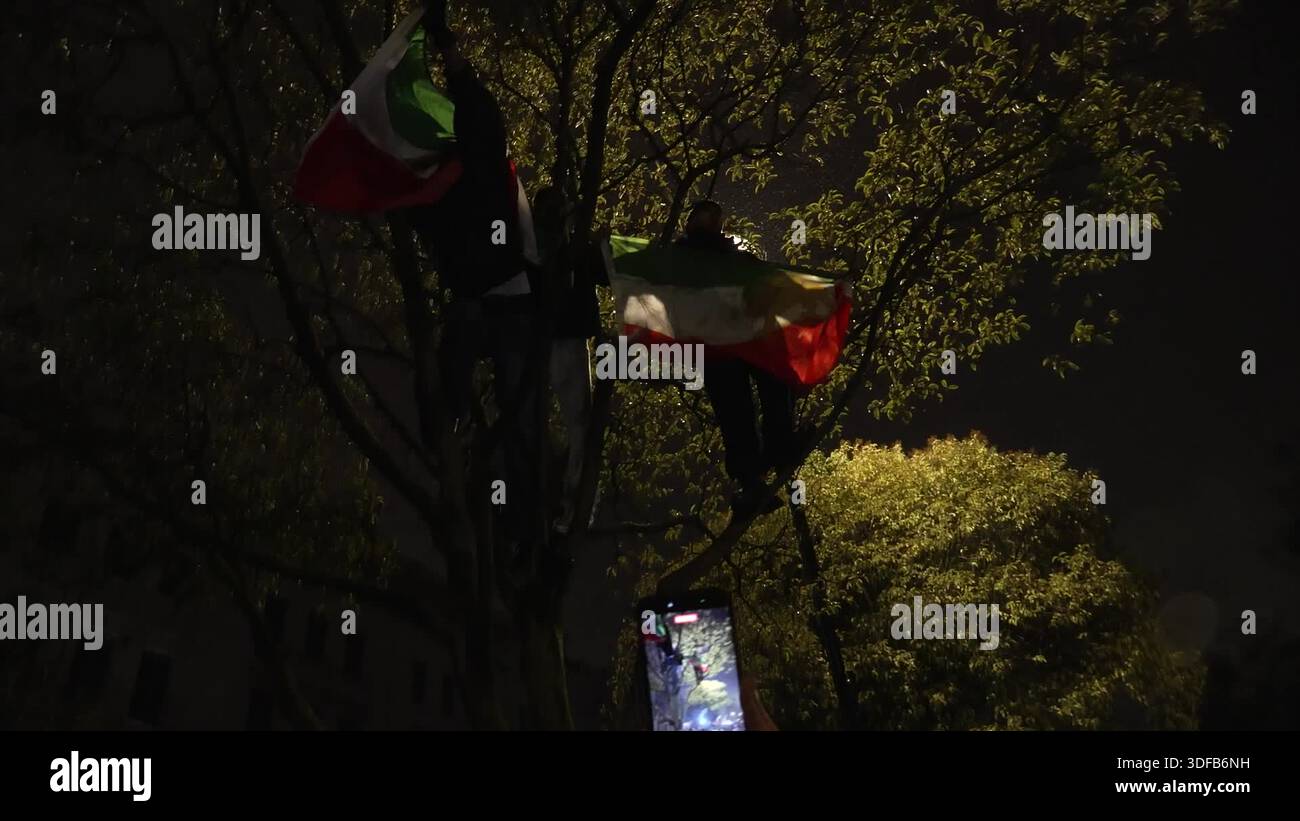 Protestors climb walls and trees to access Iranian embassy Stock Video ...