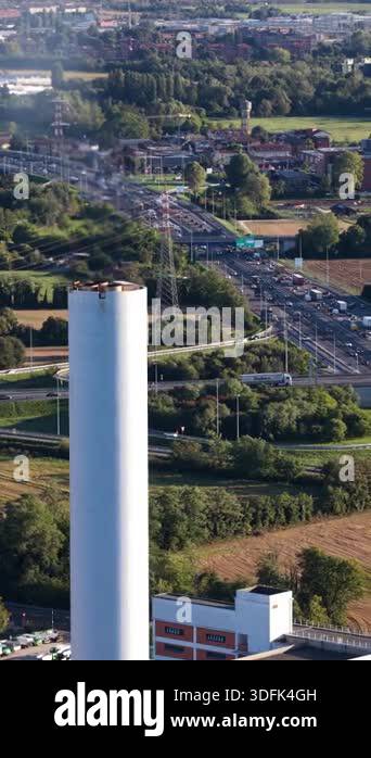 Vertical aerial video of a waste-to-energy incineration plant in Milan ...