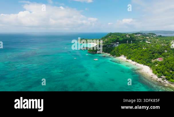 Clear calm sea water with boats under blue sky and clouds. Beaches in ...