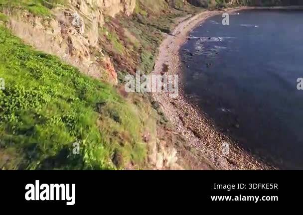 Cinematic aerial reveal of breathtaking Lunada Bay as the sun sets ...