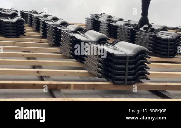 Roof Construction Involving Diligent Tile Placement And Safety ...