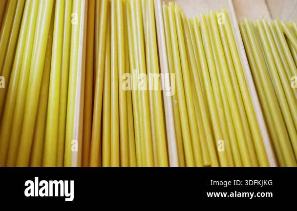 Yellow Taper Candles With Price Labels, CloseUp Of Wooden Compartment ...