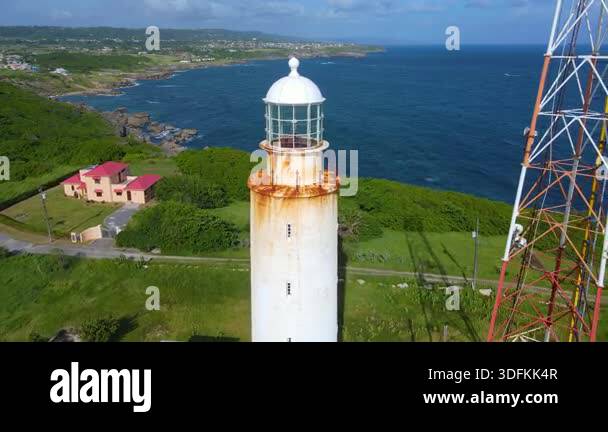 Ragged Point Lighthouse aerial view in historic village of Marley Vale ...