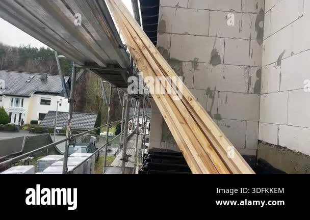 Stacked Lumber On Balcony Scaffolding Platform, Long Planks Leaning ...