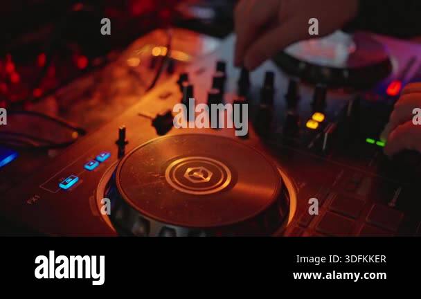DJ Operating Mixer At Nightclub, Disc Jockey Managing Console During ...