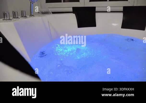 Jacuzzi.Water fills the jacuzzi. Bathing in a jacuzzi.Water bubbling in ...