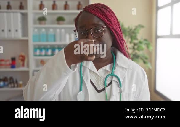 Woman doctor with stethoscope in clinic expressing different emotions ...