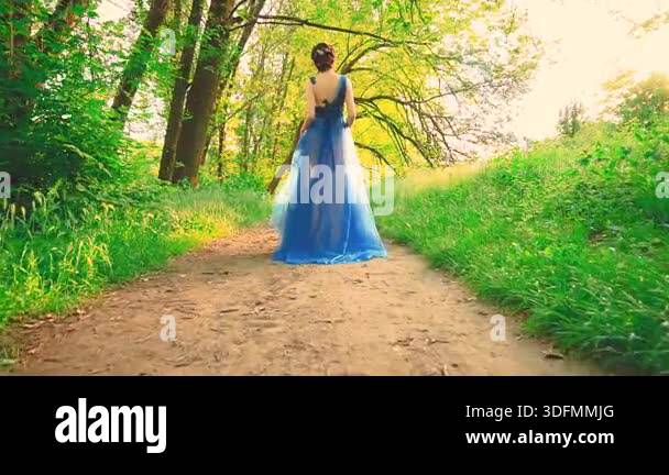 portrait young happy fantasy woman queen walks in green nature summer ...