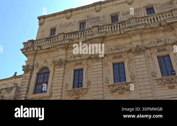 Lecce, Italy. Slow pan shot of a historic palace facade in the city ...