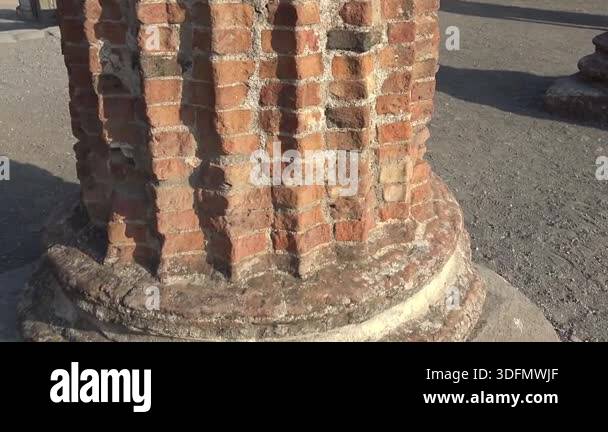 Close-up detail of the base of an ancient Roman column in Pompeii ...