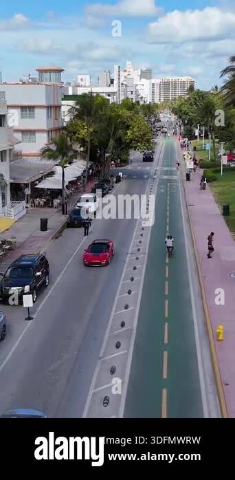 Aerial panorama of Ocean Drive showing colorful art deco hotels, palm ...