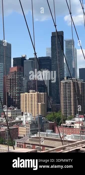 A vertical video view of New York City from the Manhattan Bridge ...