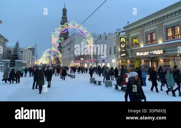 RUSSIA, KAZAN. 03-01-2019: people walking on the main decorated street ...