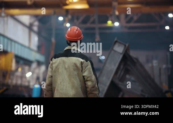 Industrial concept. Construction plant. A man controlling the process ...