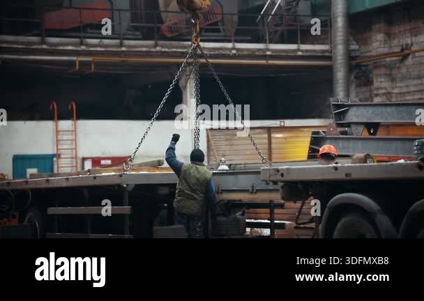 Industrial concept. Construction plant. A big lifting crane is about to ...