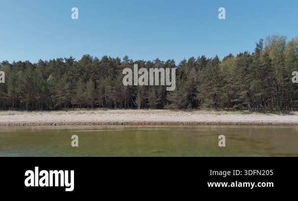 Aerial view of natural Hirmuste beach, it features a sandy shore and ...