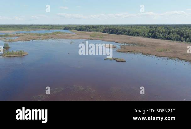 Aerial view of Tihu lake, is a shallow, heavily overgrown lagoon-type ...