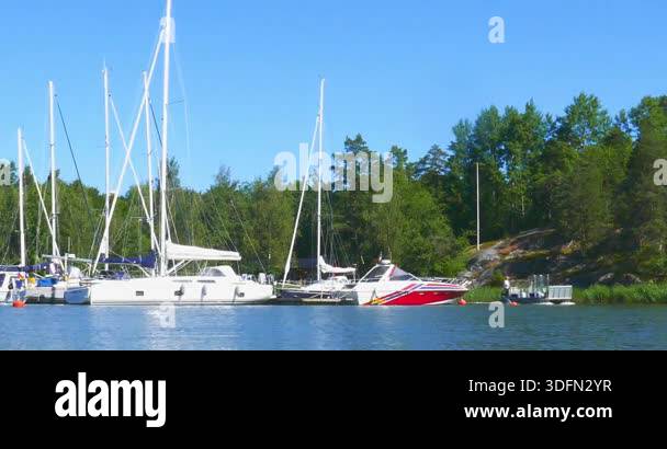 Inkoo, Finland - July 9. 2025: Small ferry coming to get passengers to ...