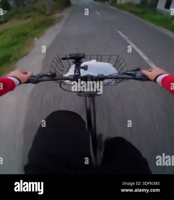 First-Person View of Riding Bike on Road Stock Video Footage - Alamy