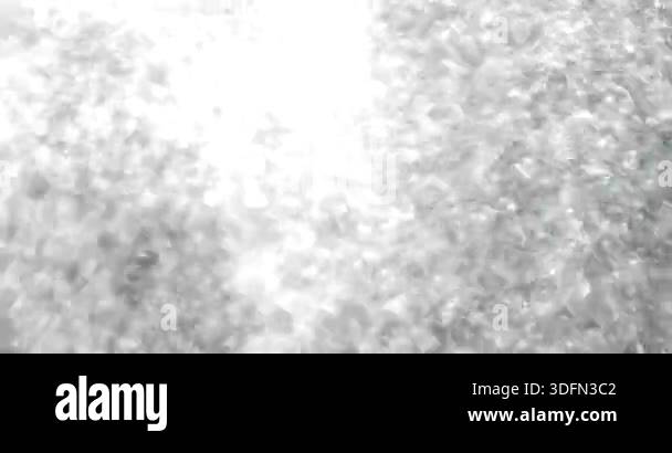 Dust particles or white snow scatter haphazardly through the air and ...