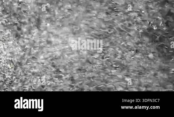 Dust particles or white snow scatter haphazardly through the air and ...