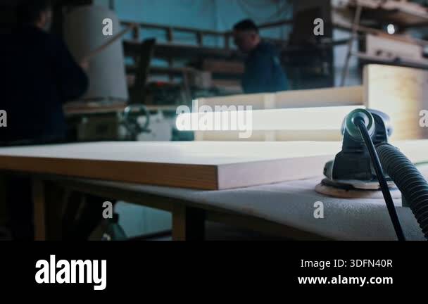 Carpentry industry - people working in the workshop. Mid shot Stock ...