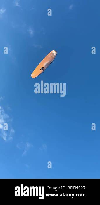 Paraglider flying against blue sky. Extreme sport background, active ...