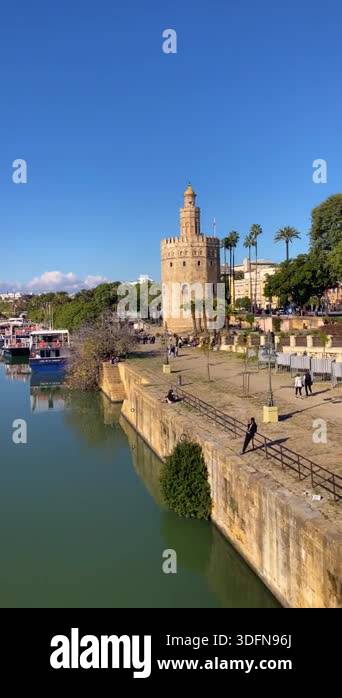 SEVILLA, SPAIN - DECEMBER 25, 2025: The iconic Golden Tower stands ...