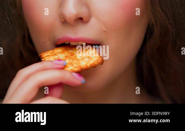 Portrait of Young Woman Eating Sweet Food on Camera Close Up. Crop Face ...