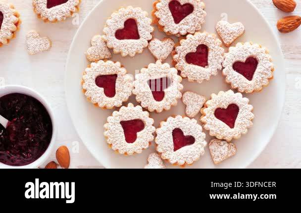 Valentines Day jam filled cookies with heart shapes. Slow rotating ...