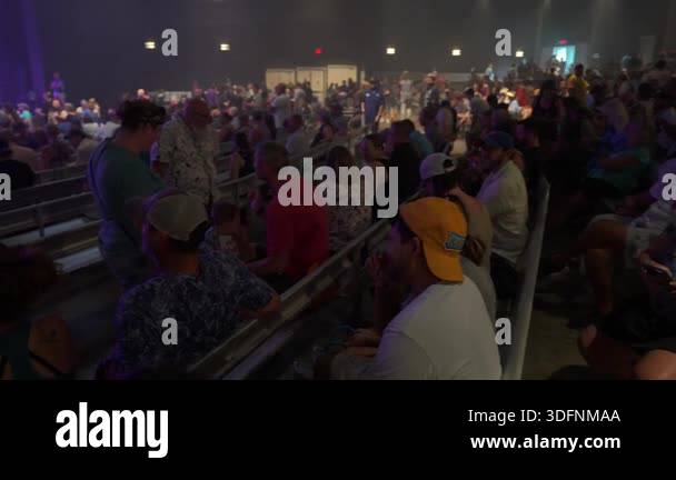 Orlando, Florida, USA - 08.17.2025: Packed seating area shows people ...