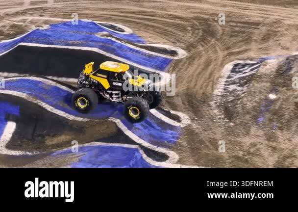 Orlando, Florida, USA - 03.02.2024: A yellow monster truck speeds ...