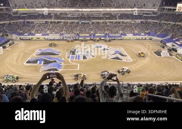 Orlando, Florida, USA - 03.02.2024: Several monster trucks compete on a ...