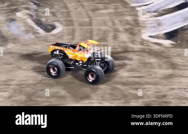 Orlando, Florida, USA - 03.02.2024: A monster truck races across a dirt ...