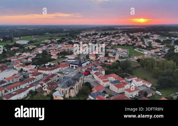 Aerial View Of A Quaint European Village At Sunset, Mache, France Stock ...