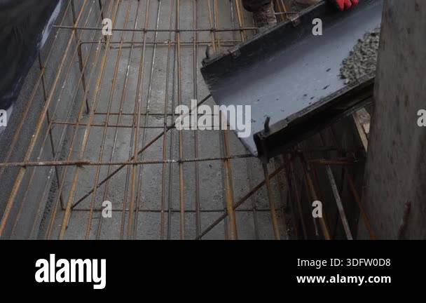 Industrial-scale concrete pouring for building construction Stock Video ...