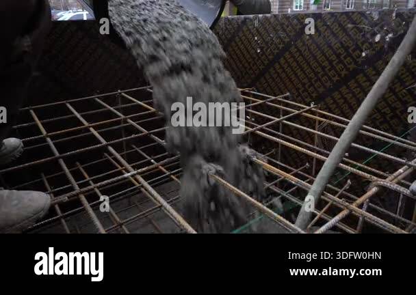 Industrial-scale concrete pouring for building construction Stock Video ...