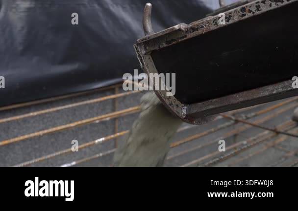Industrial-scale concrete pouring for building construction Stock Video ...