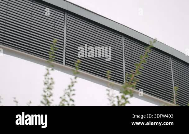 Modern Window with Rotating Automatic Blinds Adjusting Light Levels in ...