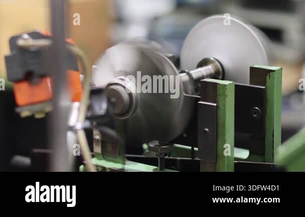 Turbocharger turbine wheel spinning rapidly on a dynamic balancing ...